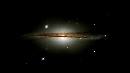 Hubble Photographs Warped Galaxy as Camera Passes Milestone | STScI