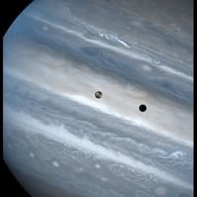 Hubble Clicks Images of Io Sweeping across Jupiter | STScI