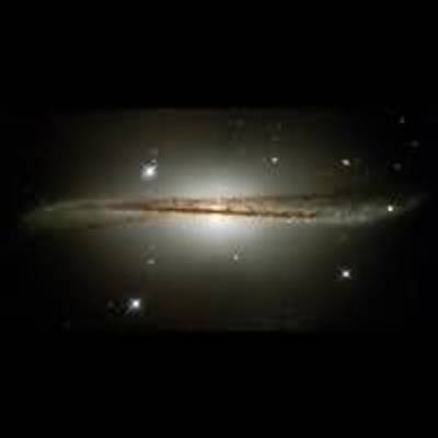 Hubble Photographs Warped Galaxy as Camera Passes Milestone | STScI